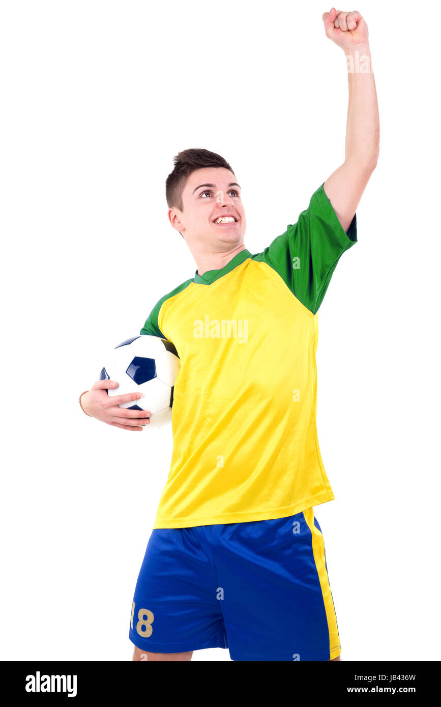 Football player with a ball isolated in white Stock Photo - Alamy