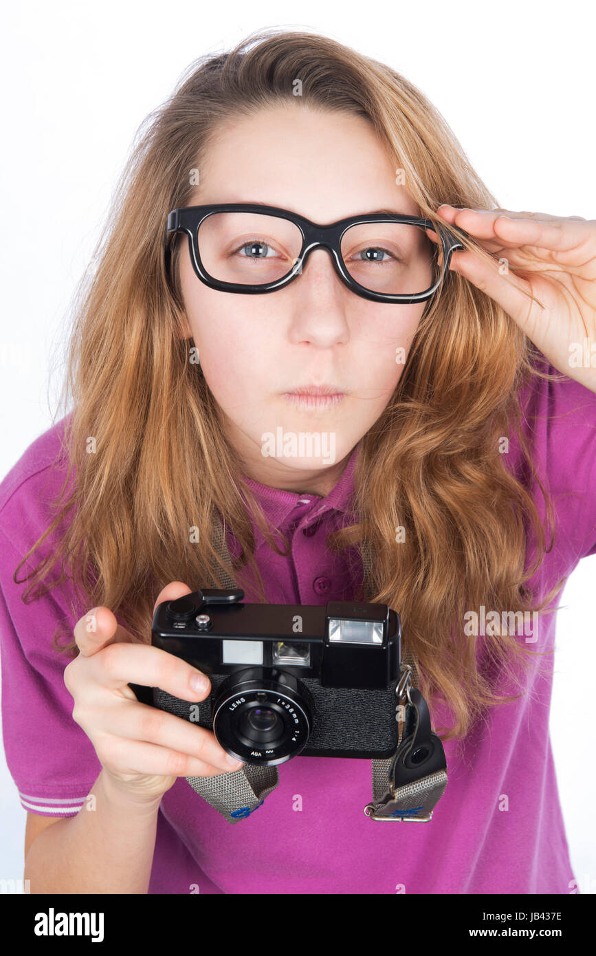 Young photographer presumptuous, look holding glasses Stock Photo - Alamy
