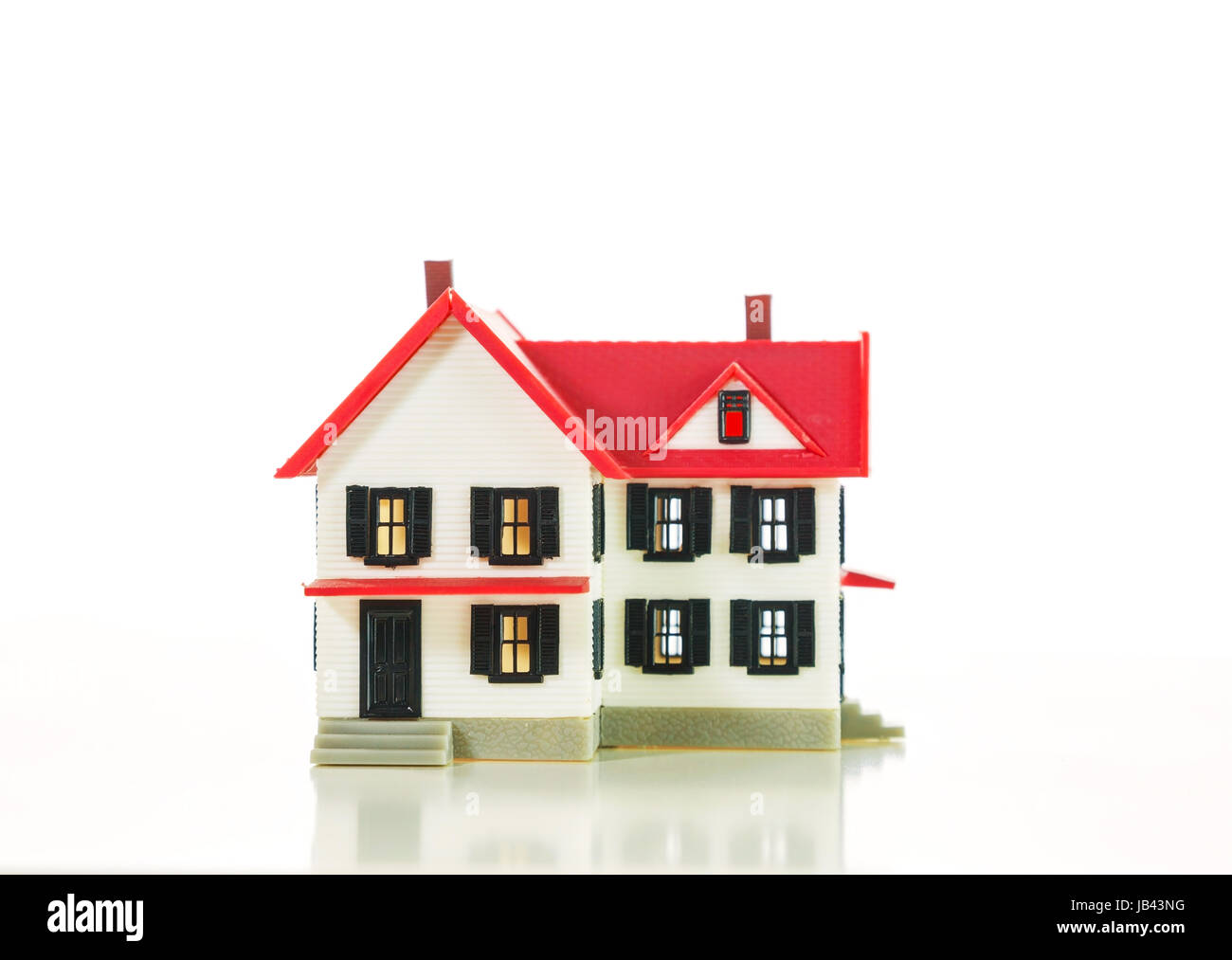 Residential house small model over the white background Stock Photo - Alamy