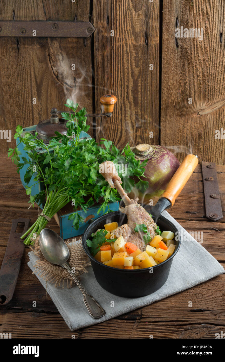 Goose - soup with red wine and thyme Stock Photo - Alamy