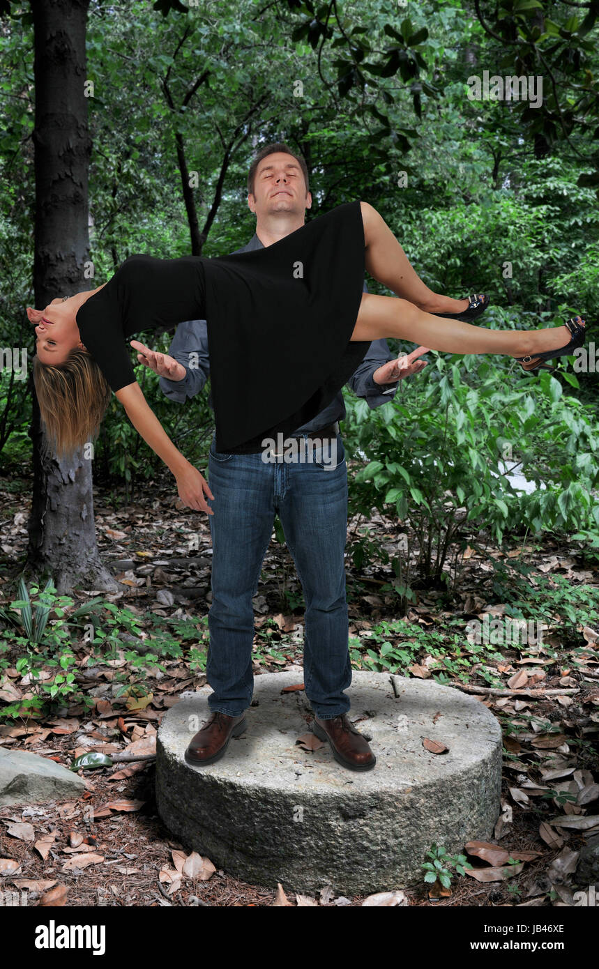 Female magician floating hi-res stock photography and images - Alamy