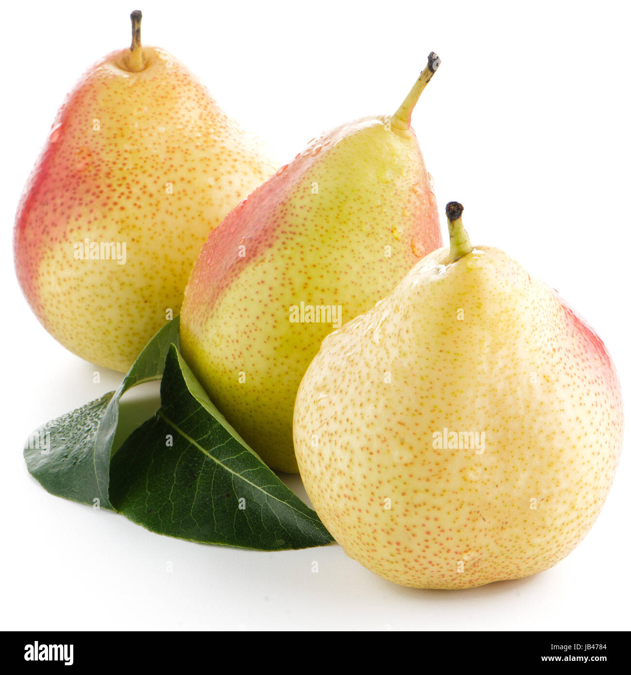 Three ripe pears isolated on white background Stock Photo - Alamy