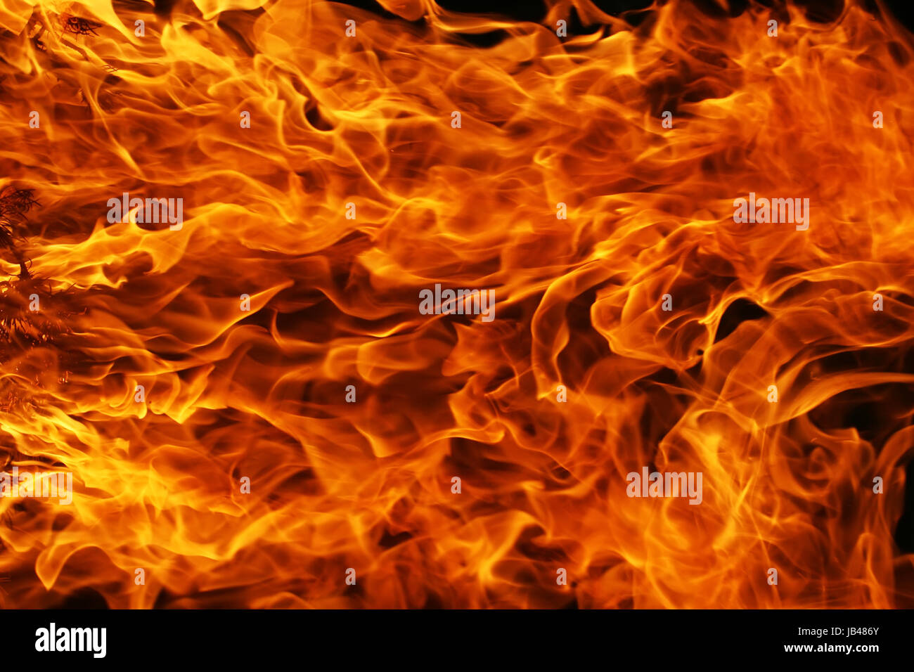 Beautiful yellow and orange hot fire on black background Stock Photo ...