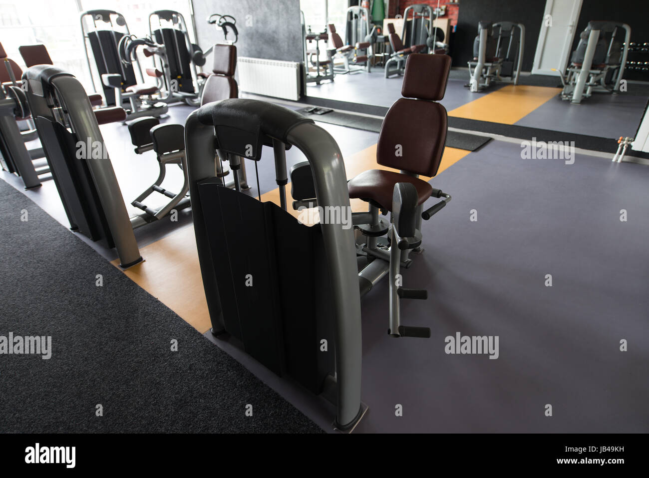 Modern Gym Room Fitness Center With Equipment And Machines Stock Photo ...