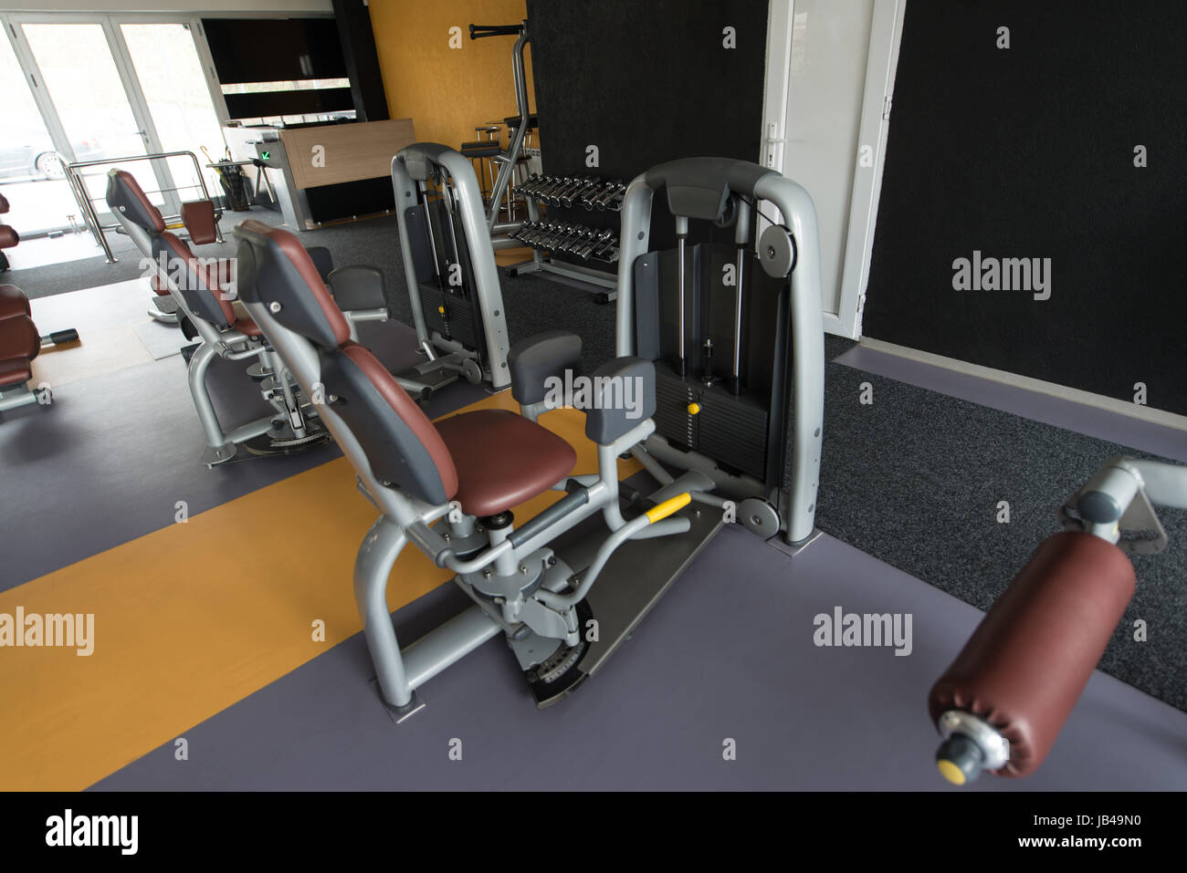 Modern Gym Room Fitness Center With Equipment And Machines Stock Photo ...