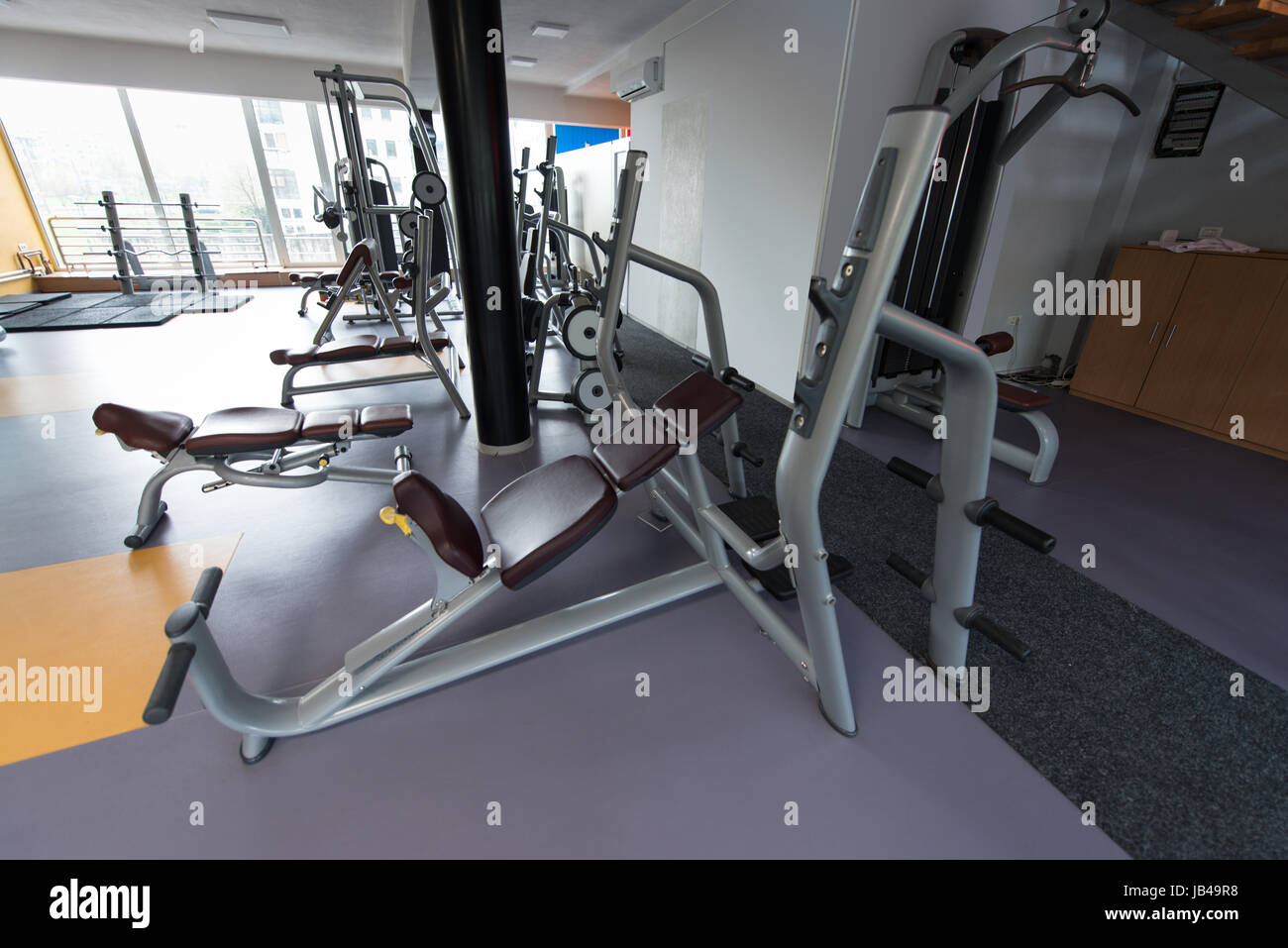 Modern Gym Room Fitness Center With Equipment And Machines Stock Photo ...