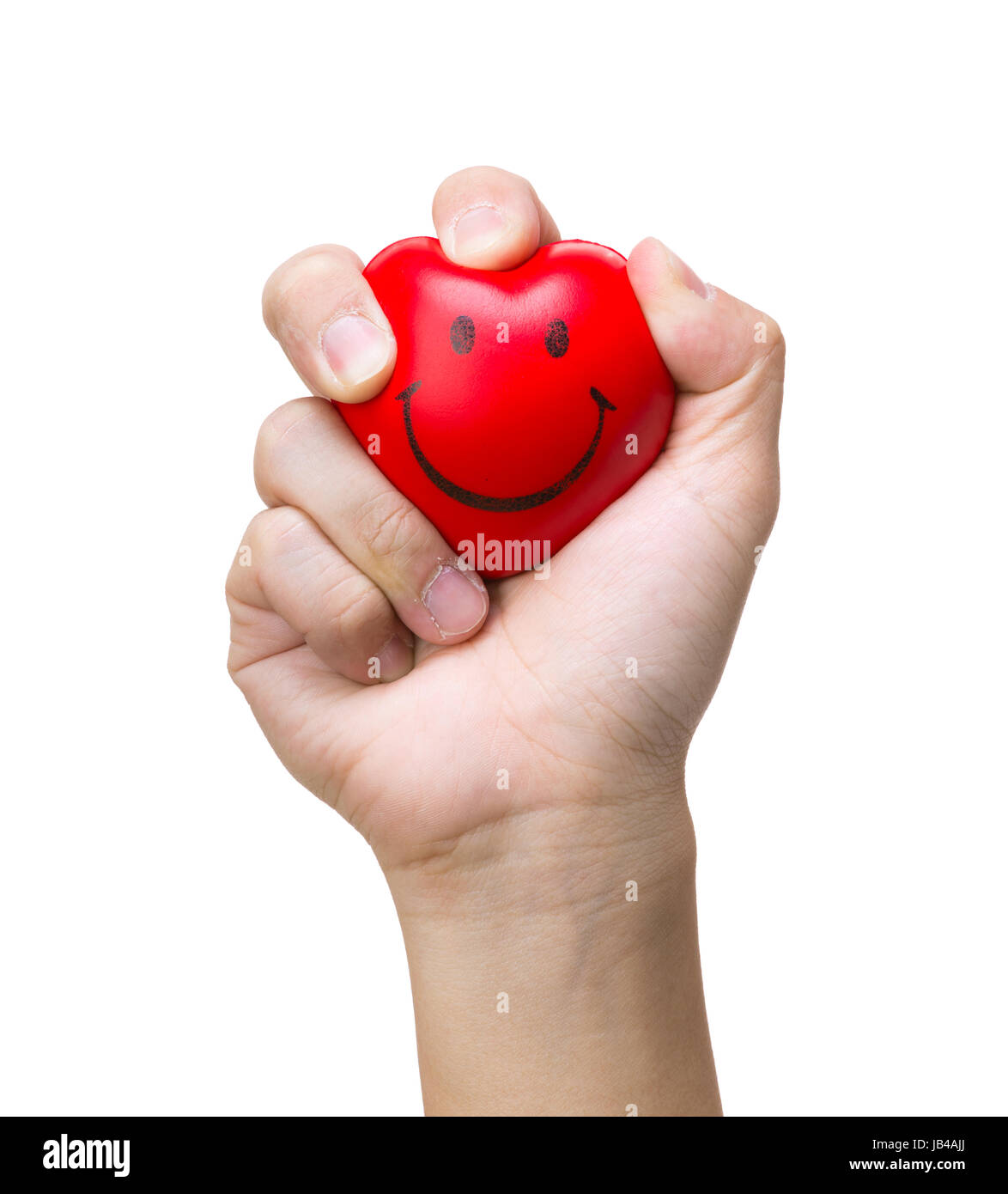 Hand squeezing a stress ball Stock Photo - Alamy