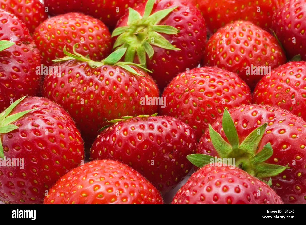 Red sweet strawberries making nice edible background Stock Photo - Alamy