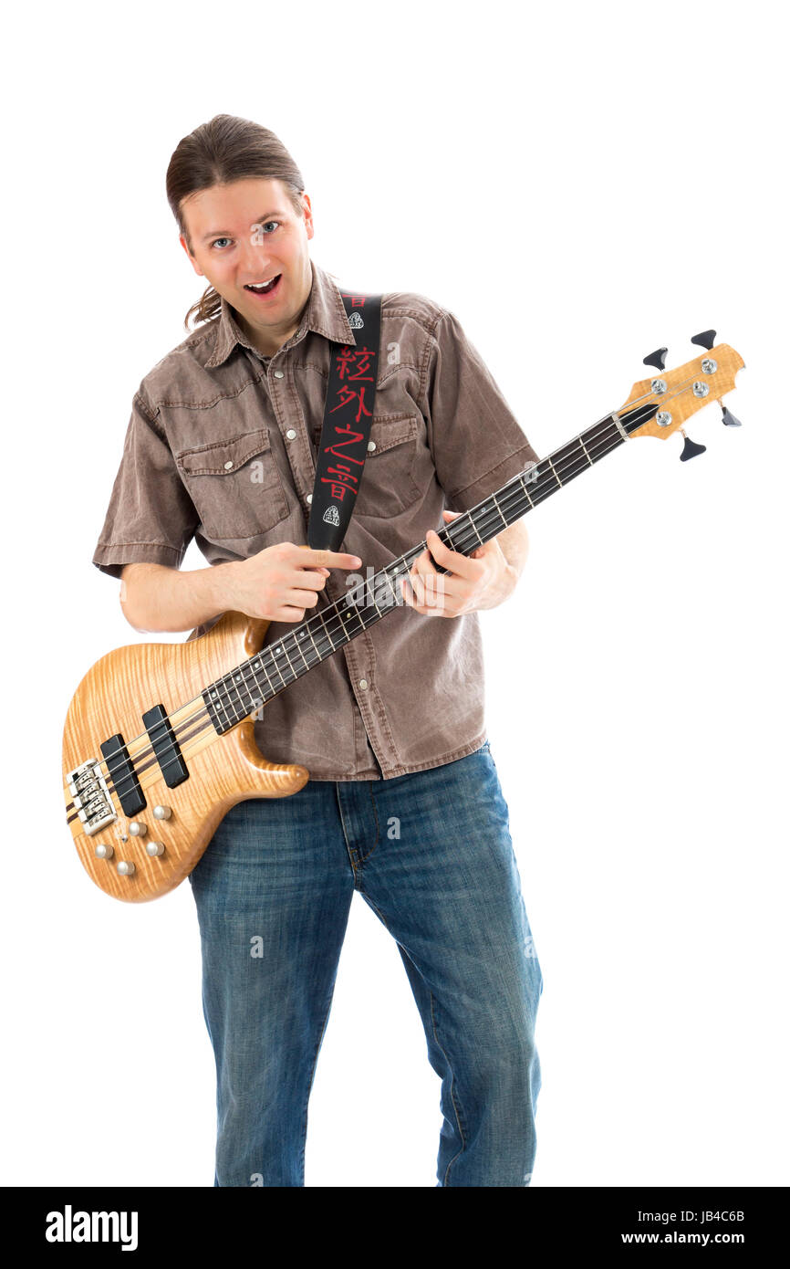 Bass guitarist playing his bass with a smile (Series with the same ...