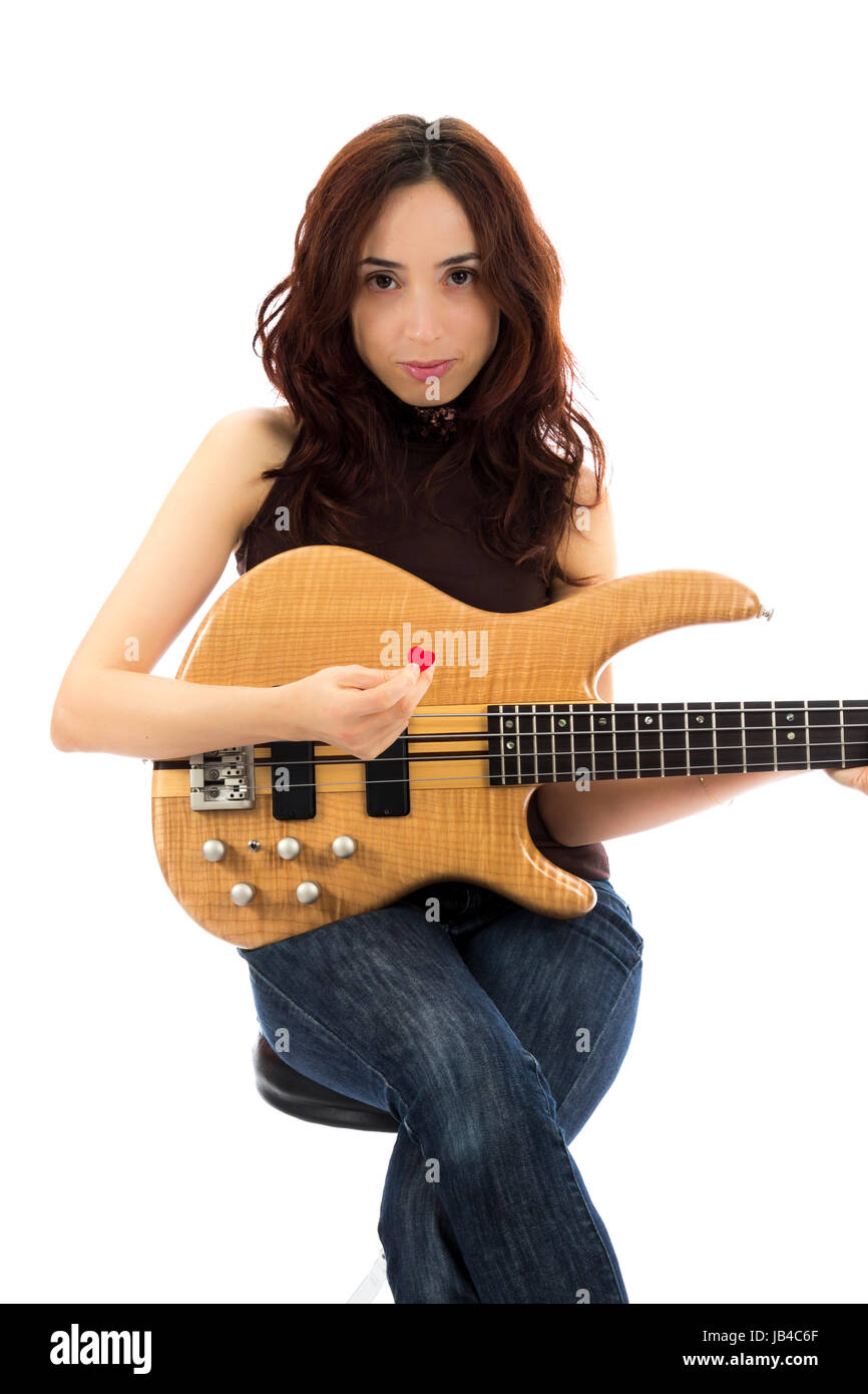 Young woman playing a bass guitar (Series with the same model available ...