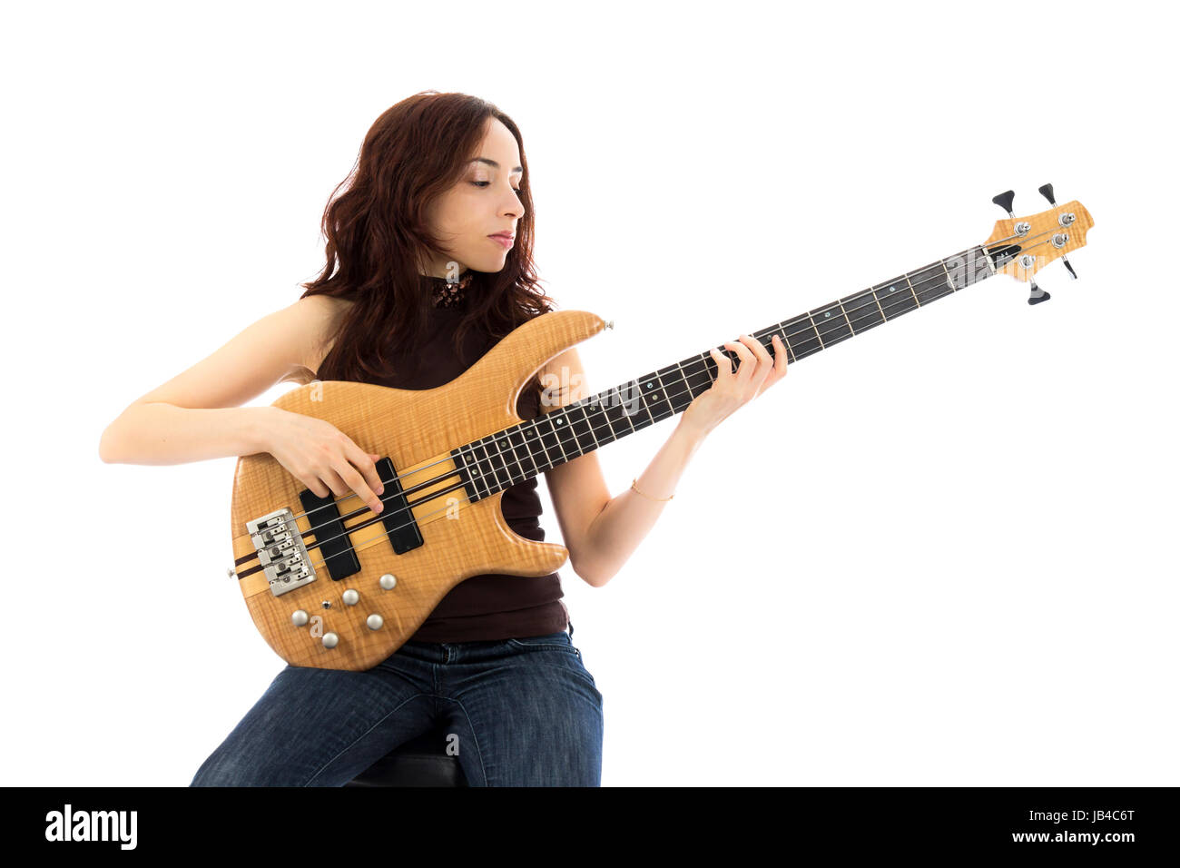 Young woman playing a bass guitar (Series with the same model available ...