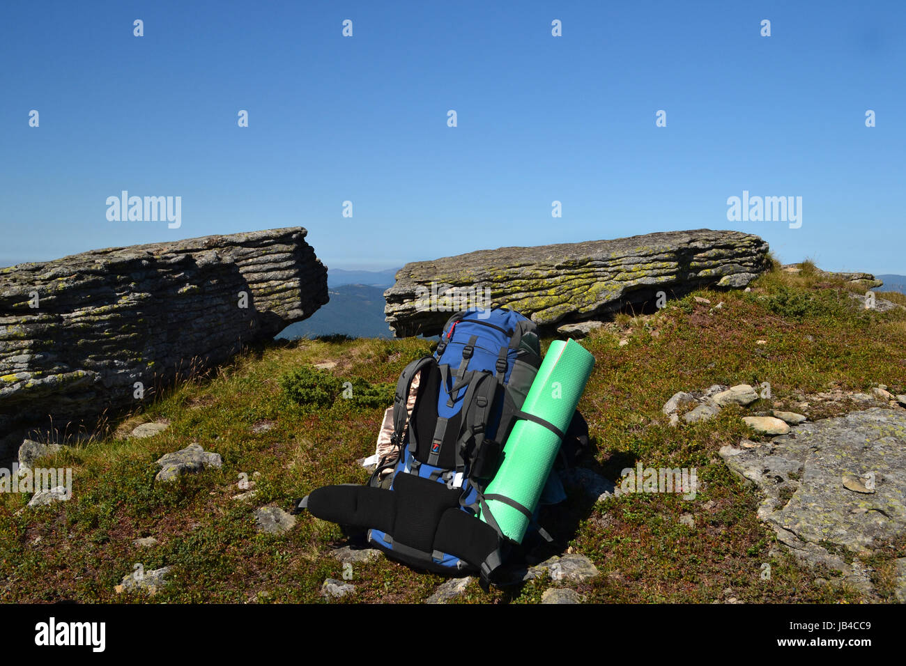 blue backpack in the mountains Stock Photo - Alamy