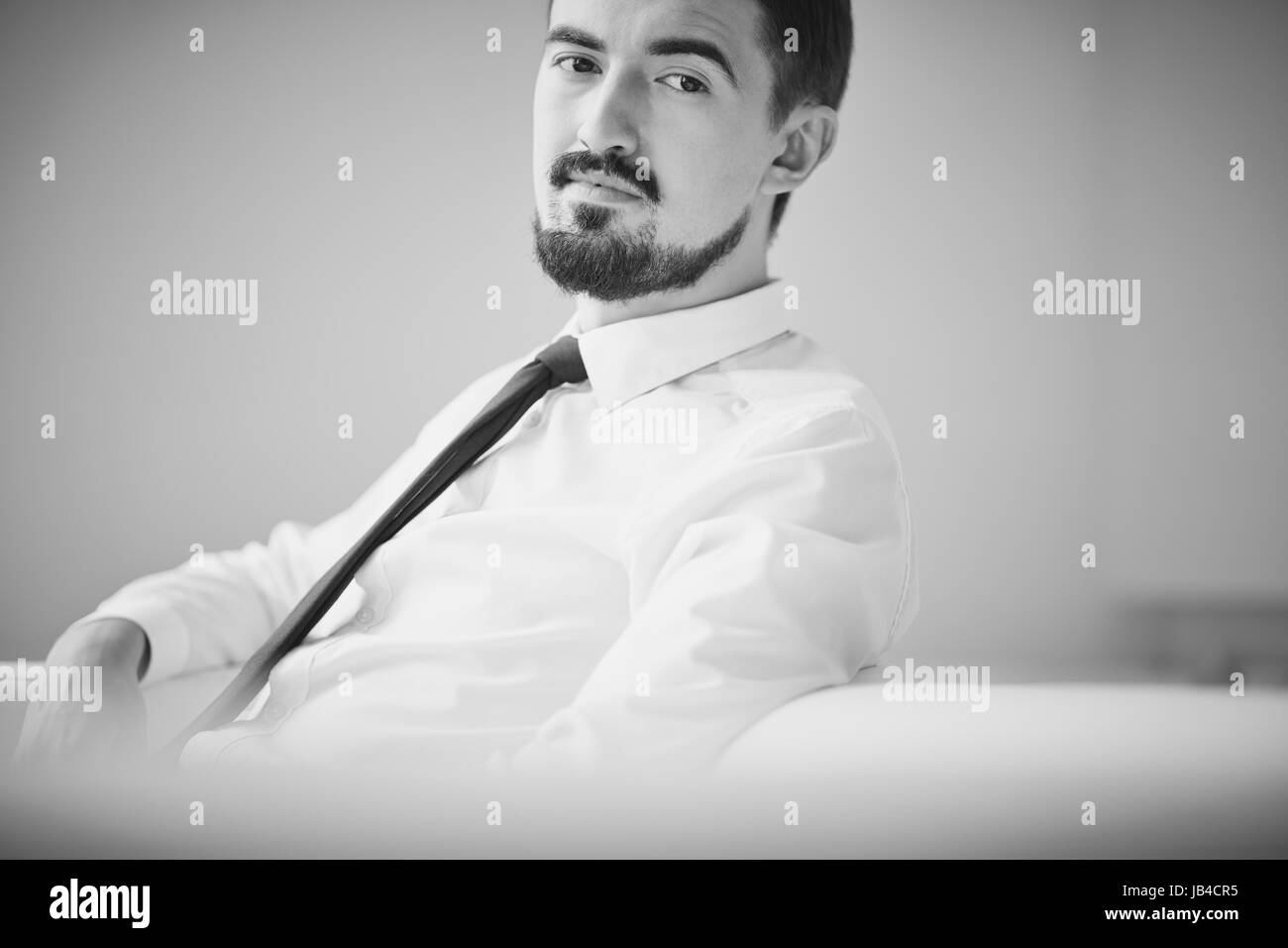 Portrait of posh guy in formalwear looking at camera Stock Photo - Alamy