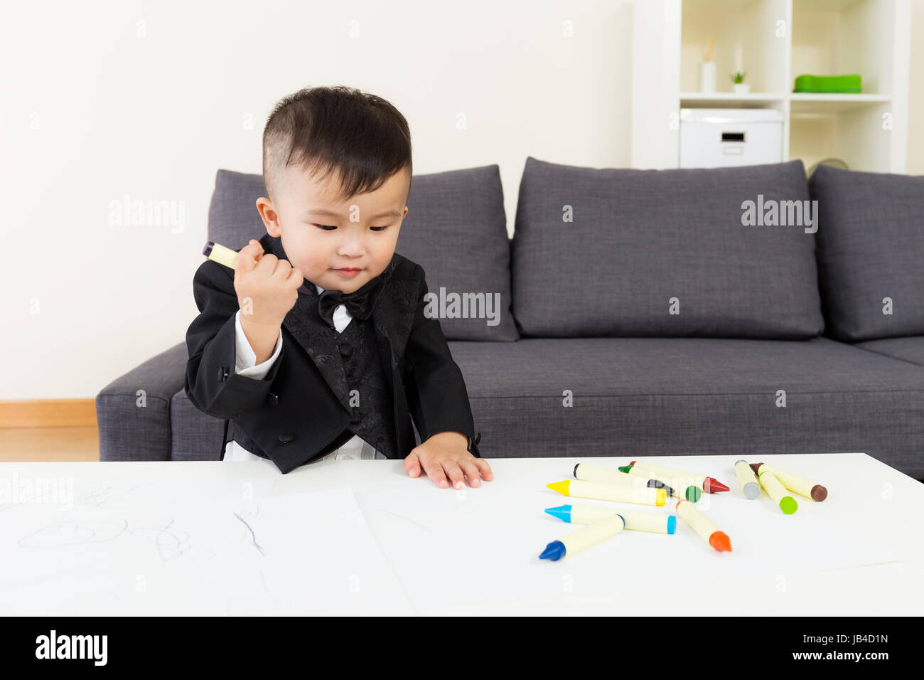 Little boy drawing at home Stock Photo - Alamy