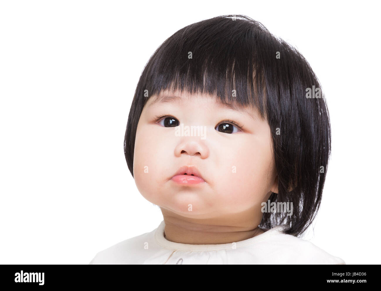 Cute baby girl looking up Stock Photo - Alamy