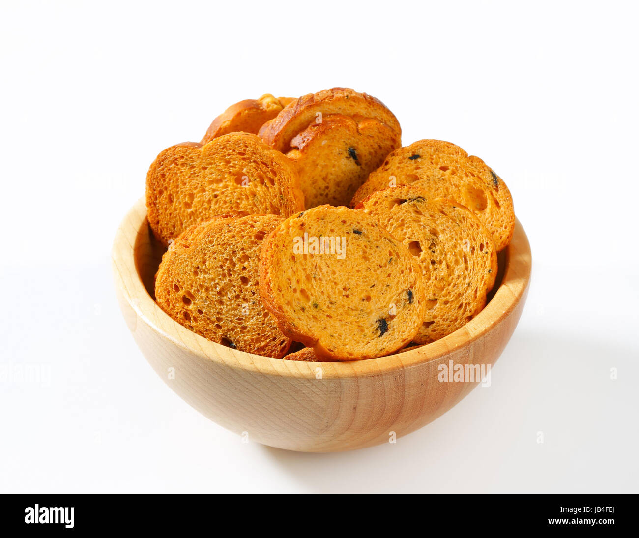 Small round toasts with black olives Stock Photo - Alamy