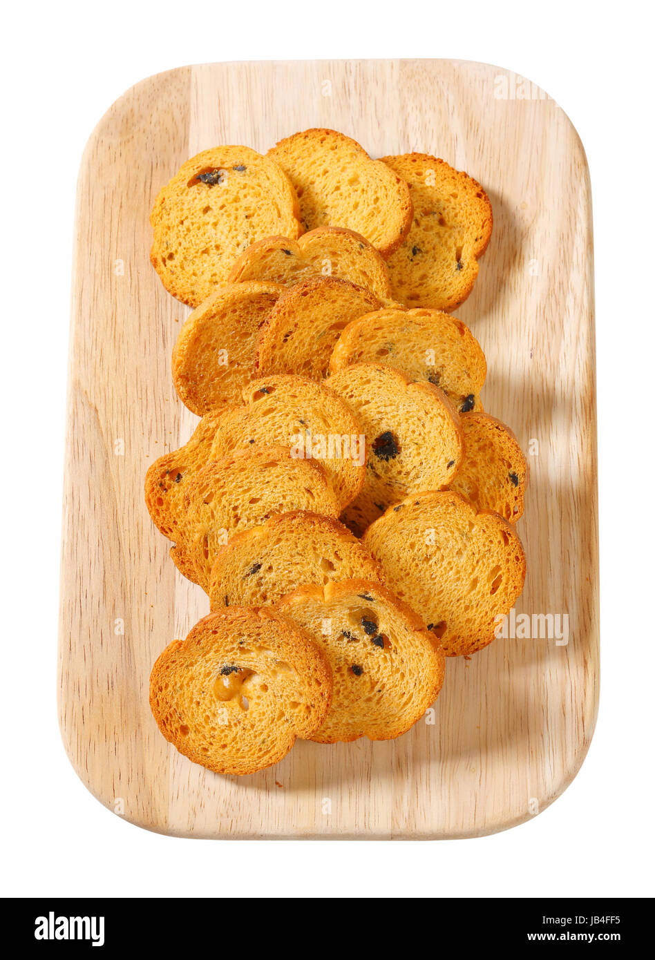 Small round toasts with black olives Stock Photo - Alamy