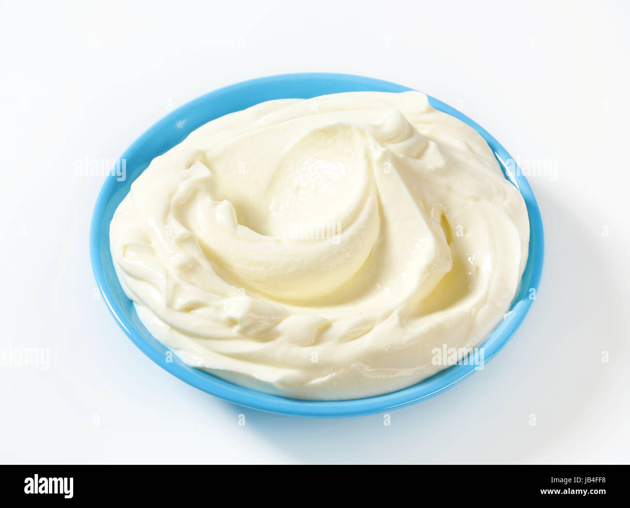 Plate of cream cheese -studio shot Stock Photo - Alamy