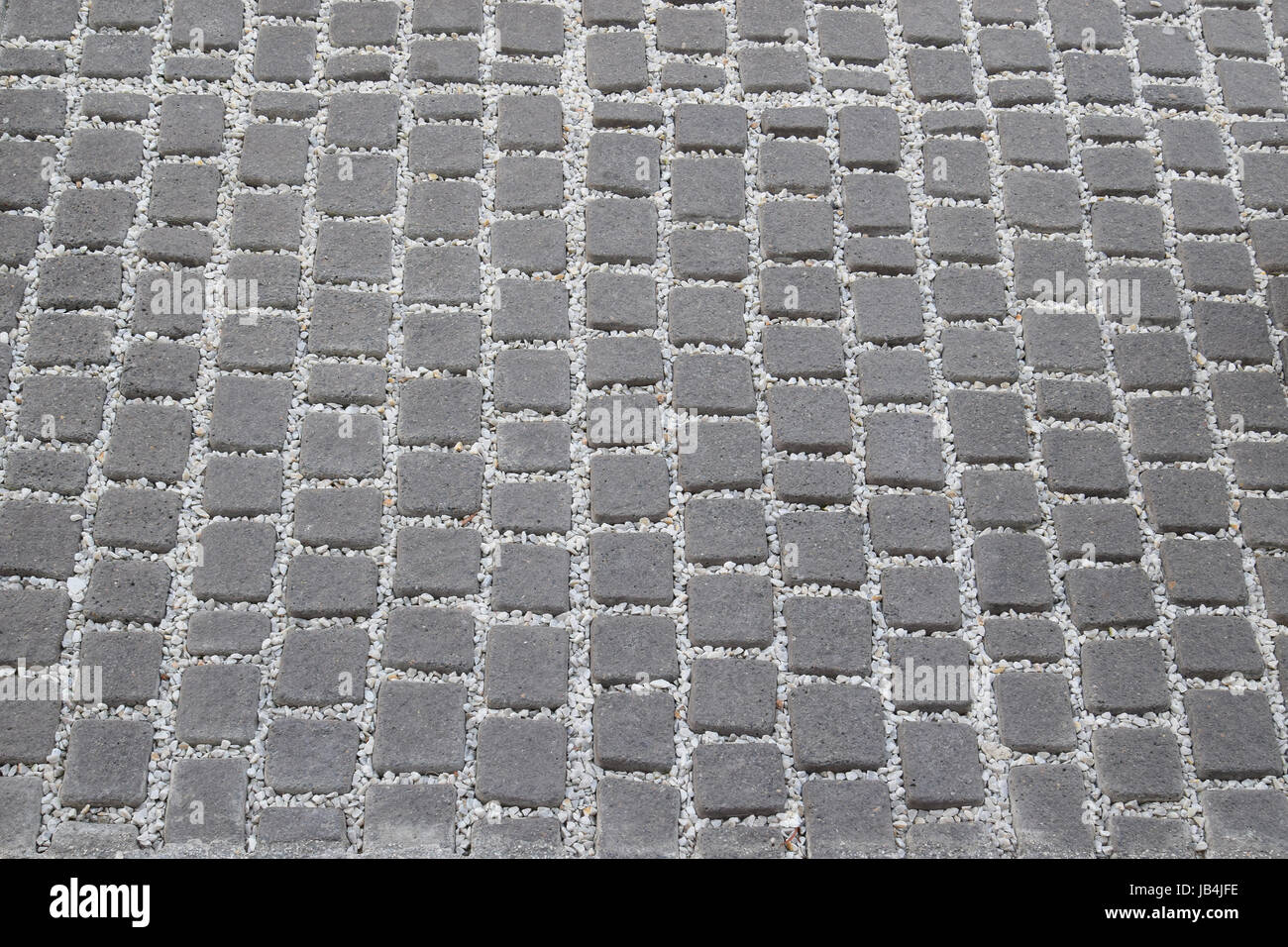 pattern of granite cobble stoned pavement background Stock Photo - Alamy