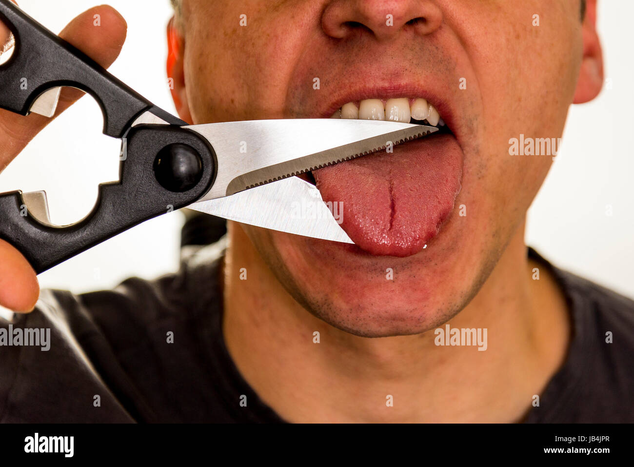 Man cutting off bad hi-res stock photography and images - Alamy