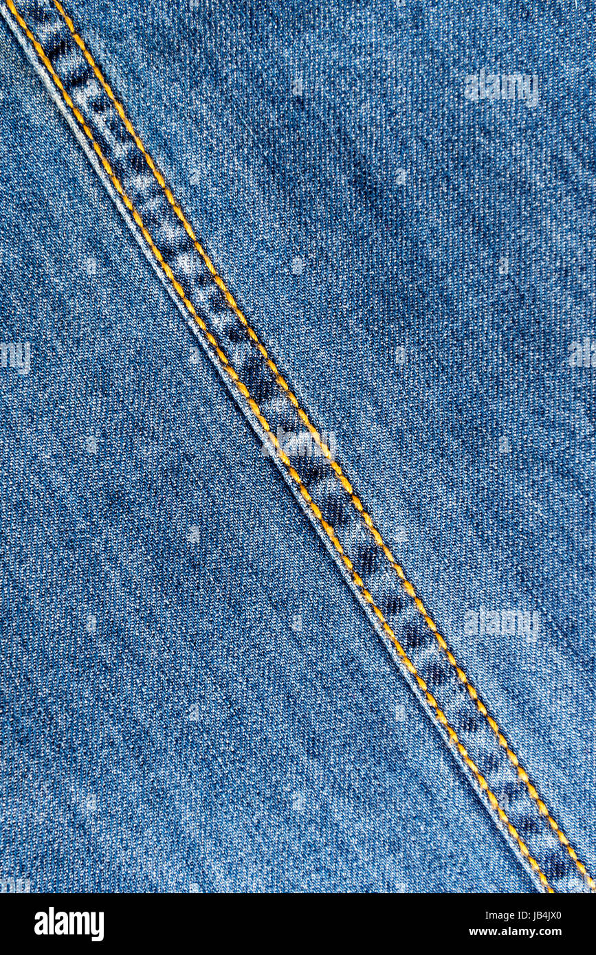 blue jeans fabric with diagonal seam Stock Photo - Alamy