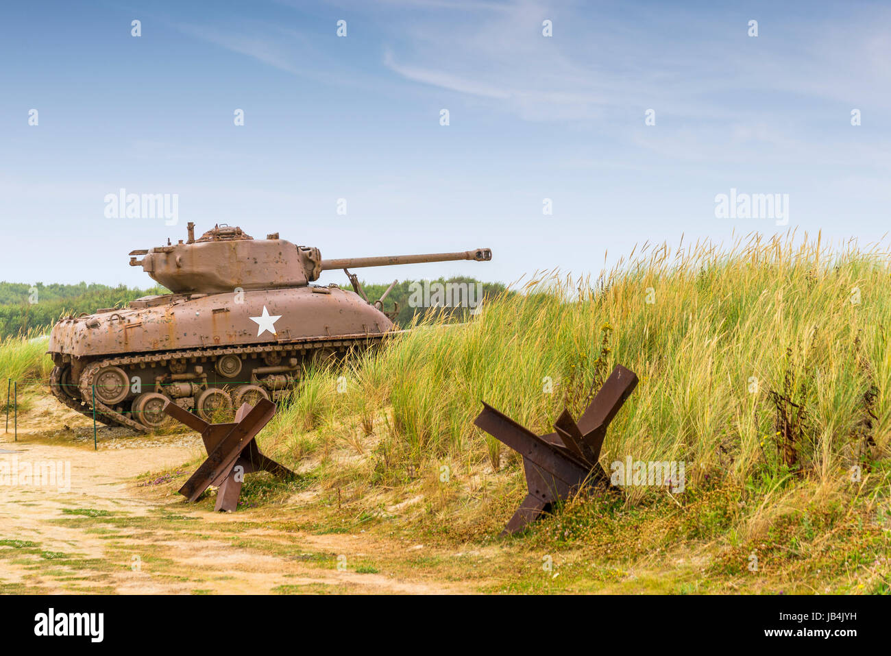 a ww2 sherman tank on utah beach normandy Stock Photo - Alamy