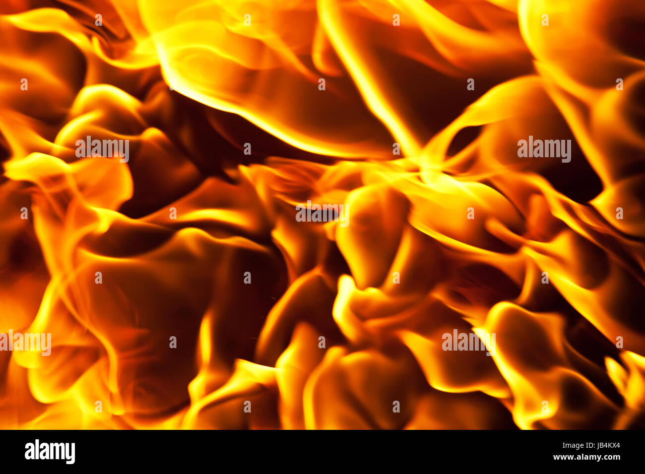 Beautiful yellow and orange hot fire on black background Stock Photo ...