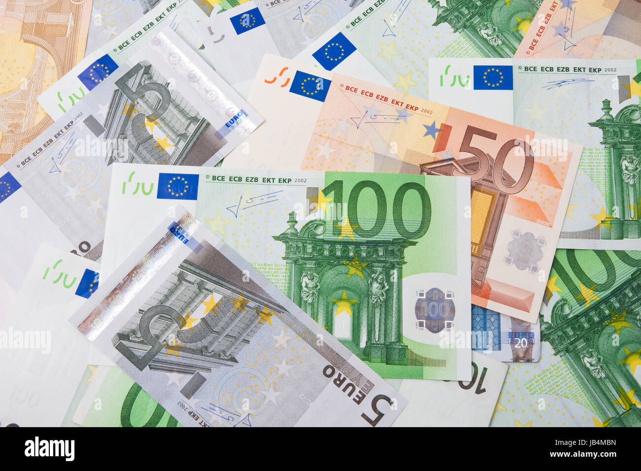 Many euro banknotes making european currency background Stock Photo - Alamy