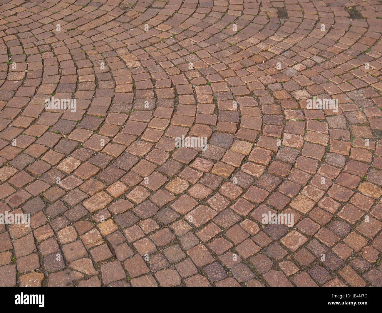 Red porphyry stone floor useful as a background Stock Photo - Alamy