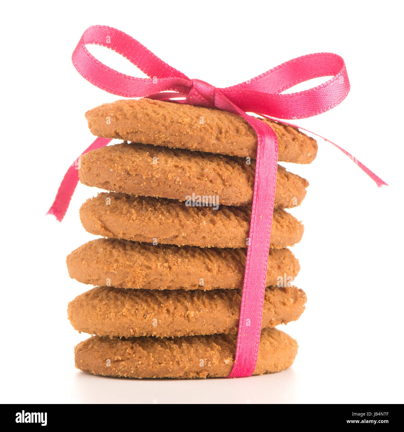 Festive wrapped biscuits pile isolated on a white background Stock ...