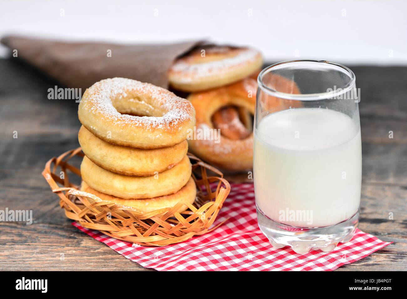 Sweet donuts on wooden background Stock Photo - Alamy