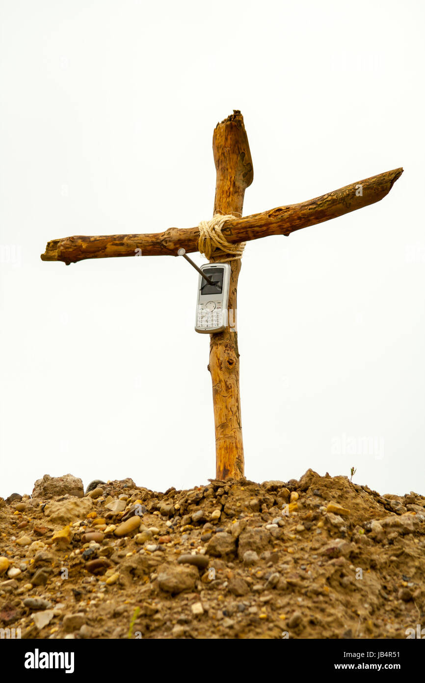 cellphone on wooden cross Stock Photo - Alamy