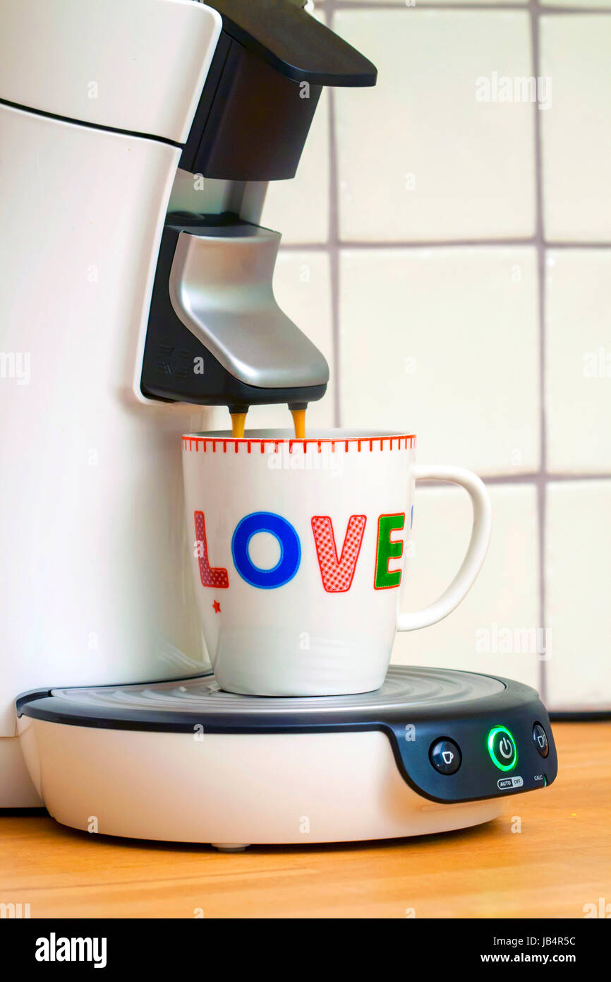 coffeemachine with cup of coffee Stock Photo - Alamy