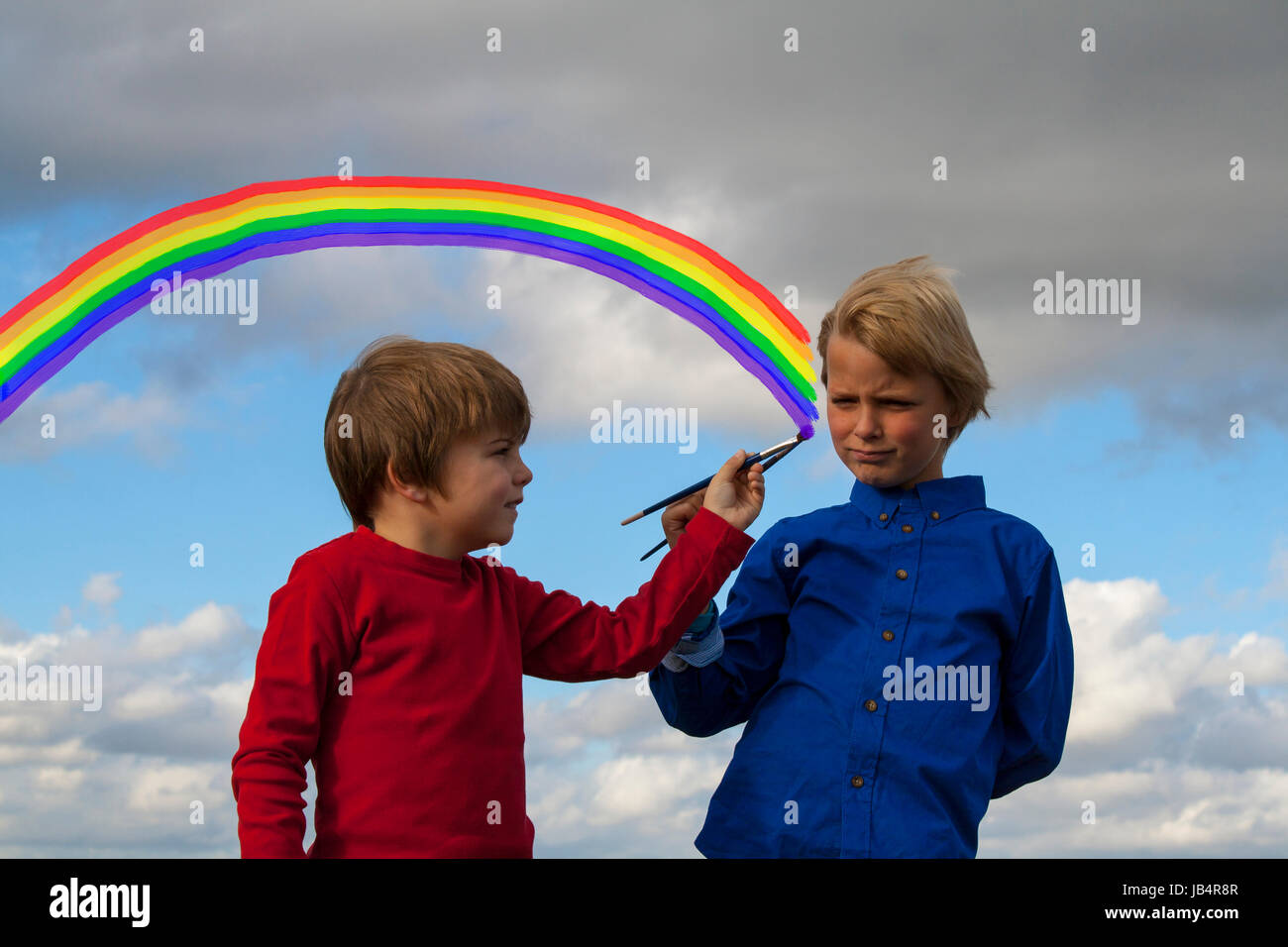 kids painting rainbow Stock Photo - Alamy