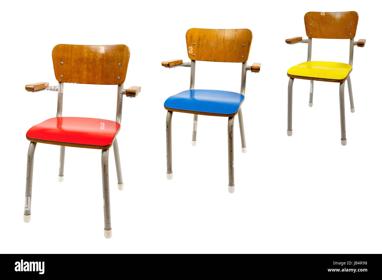 three colorful school chairs Stock Photo - Alamy