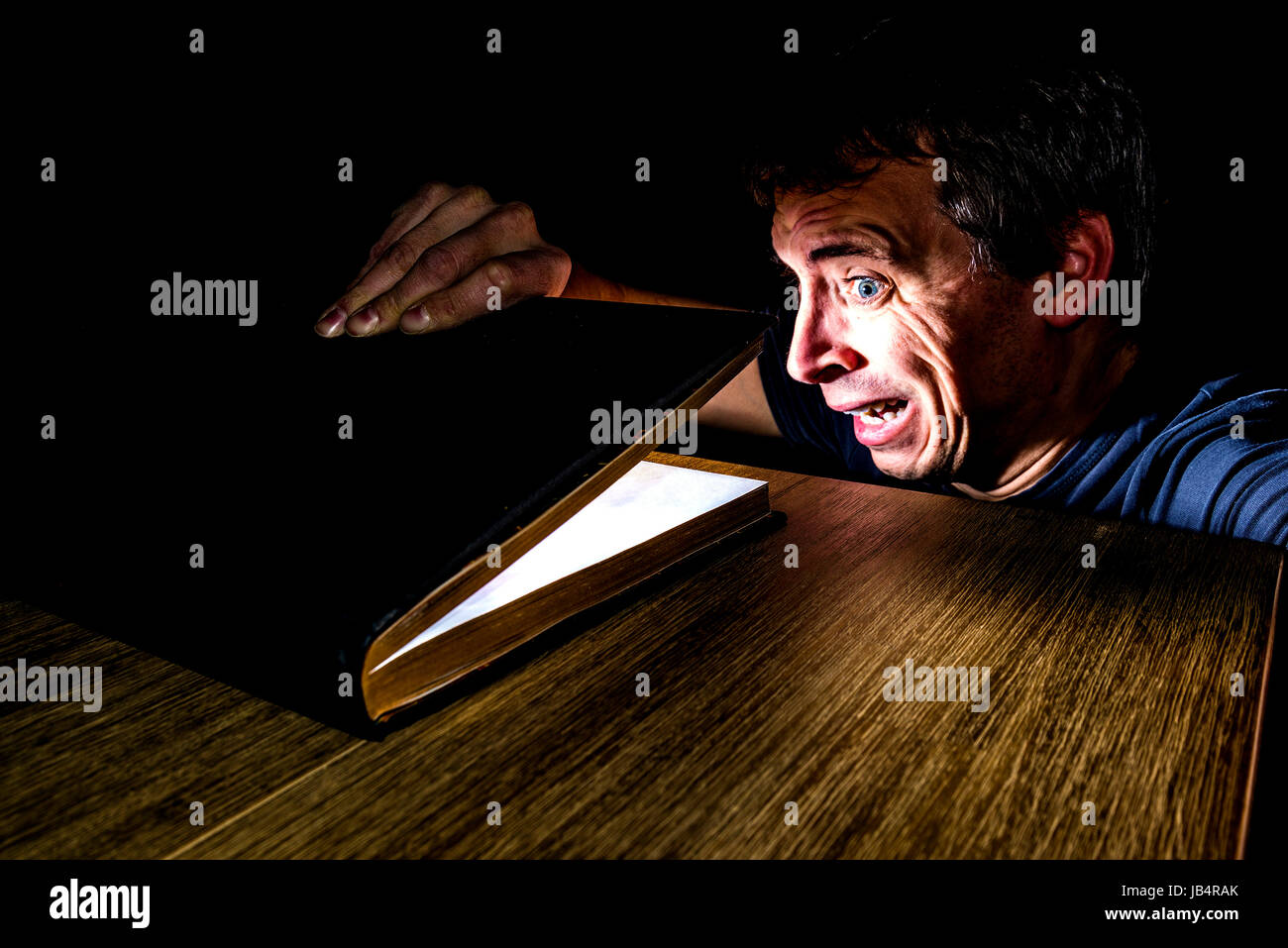 Man coming out book concept hi-res stock photography and images - Alamy