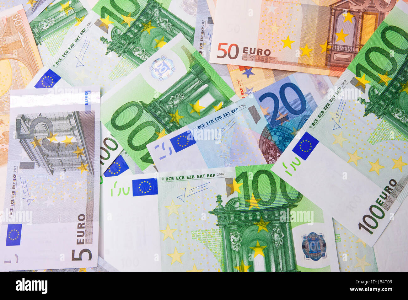 Many euro banknotes making european currency background Stock Photo - Alamy