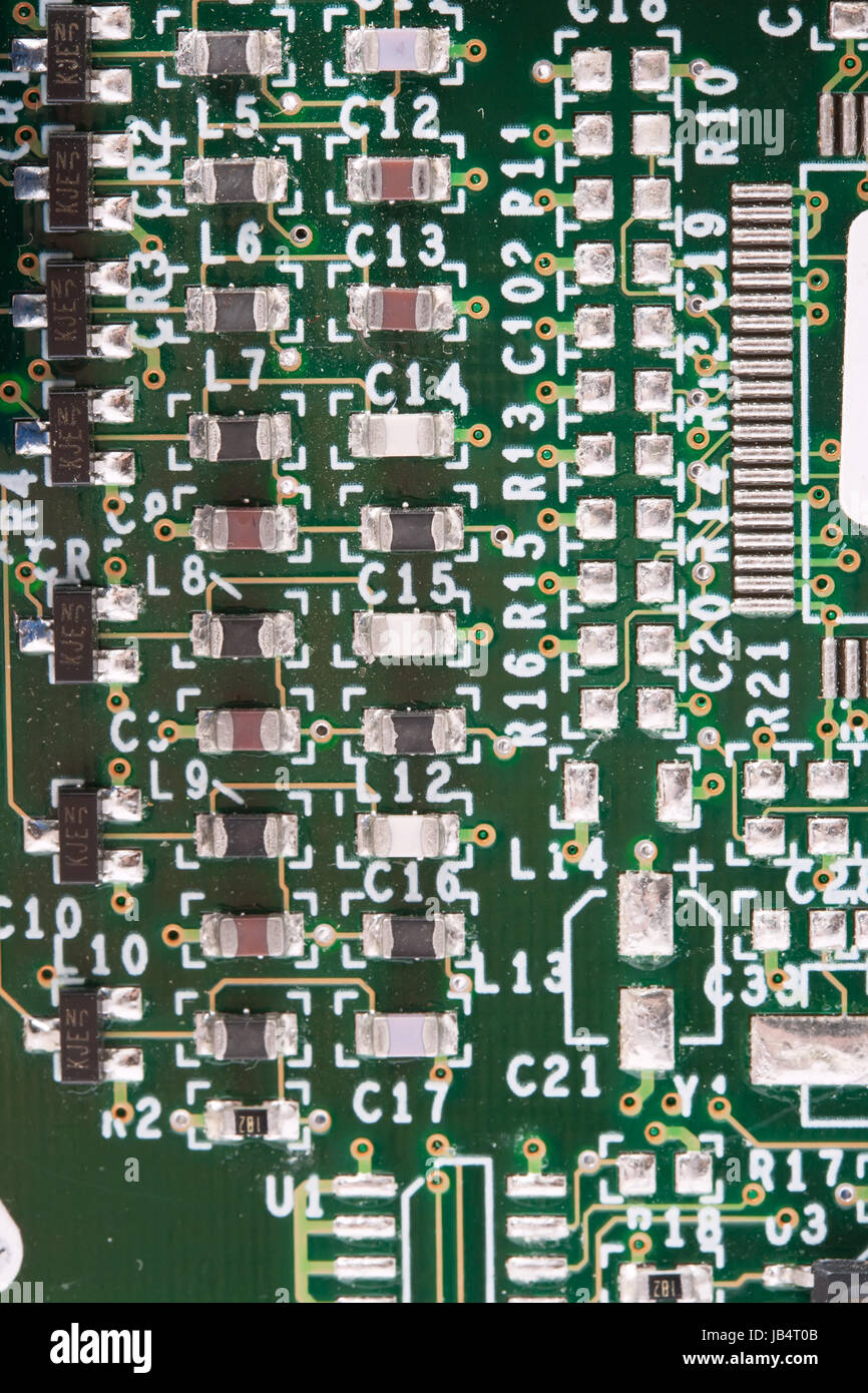 Close-up photo of electronic circuit board with integrated microchips ...