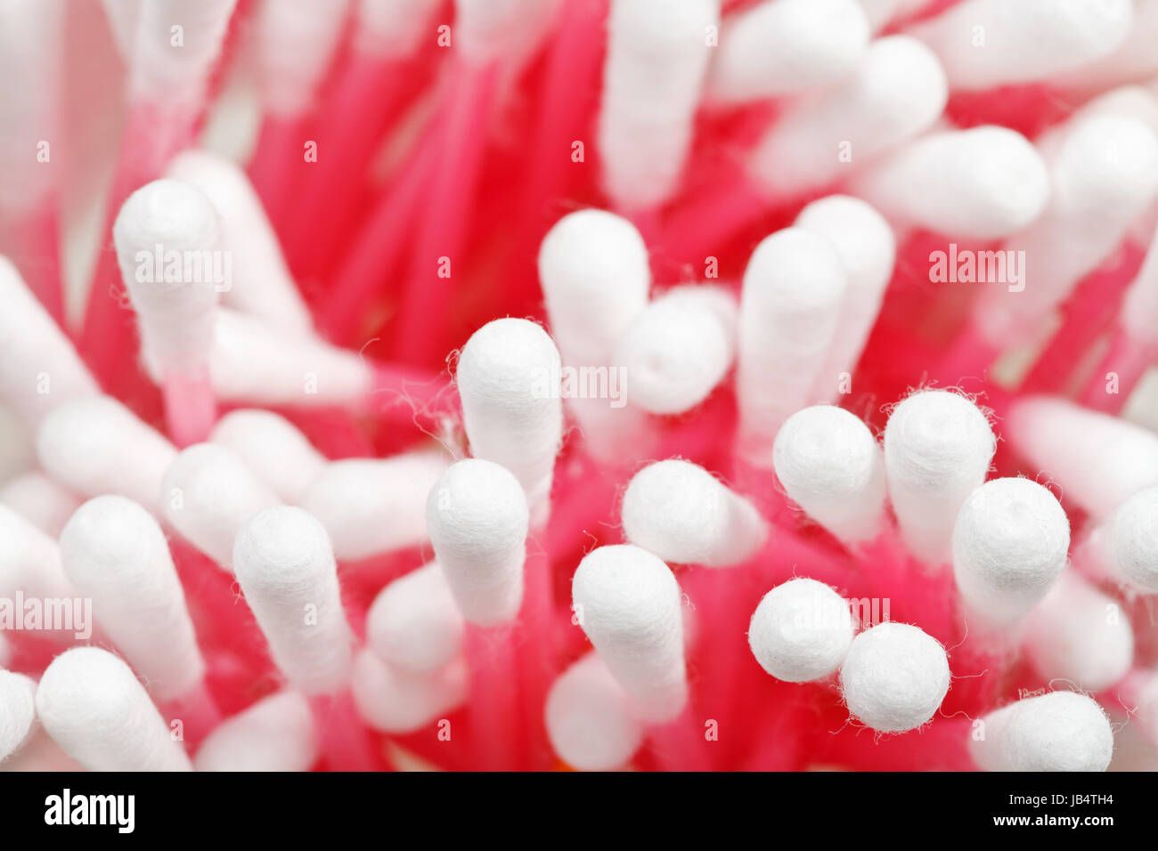 Many pink plastic cotton swabs close up Stock Photo - Alamy
