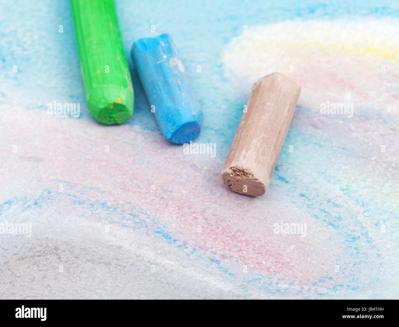 three used sticks of dry pastel on painting picture close up Stock ...