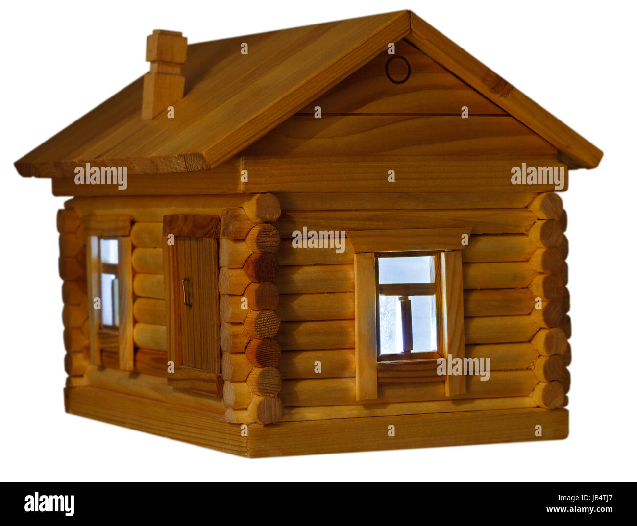 blue light in window of model of village wooden log house at night ...