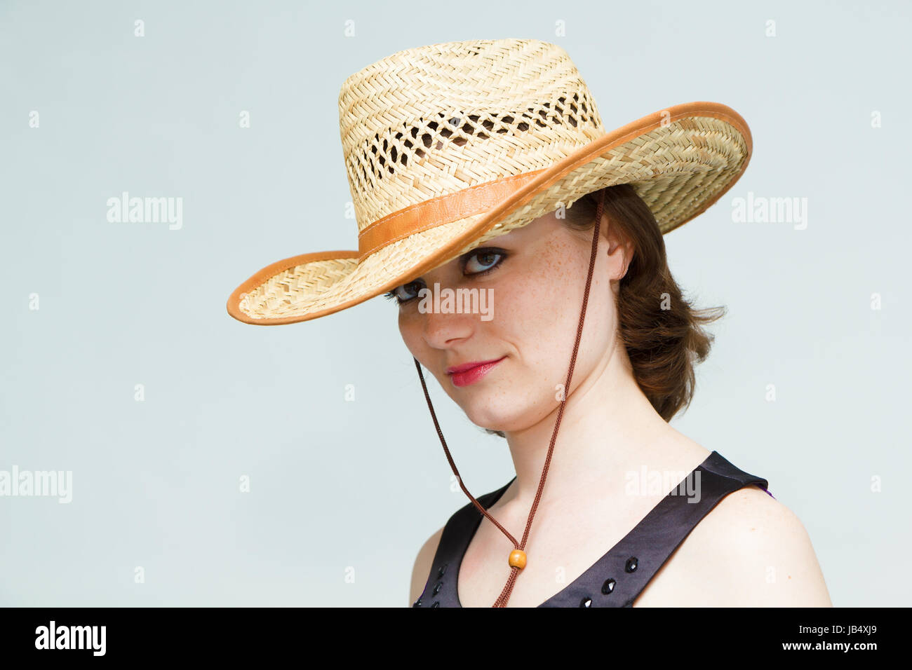 attractive girl in a straw hat. portrait Stock Photo - Alamy