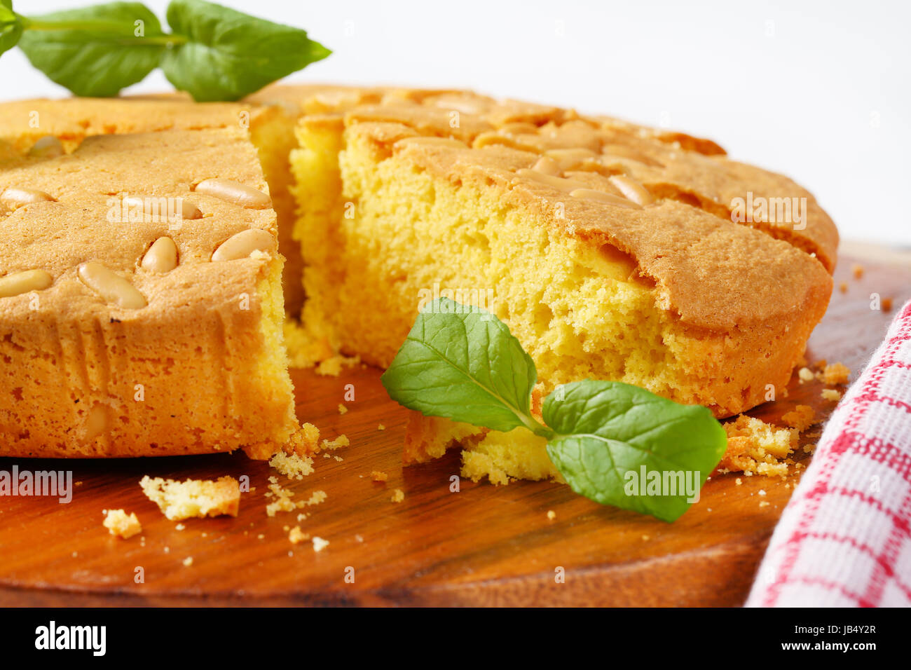 Slices of butter sponge cake on a cutting board Stock Photo - Alamy