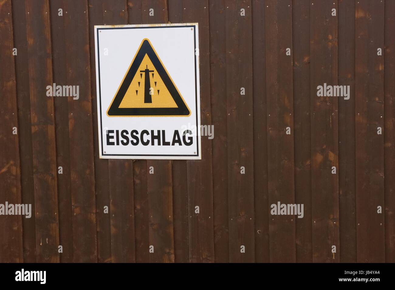 warning sign on the transmission tower Stock Photo - Alamy