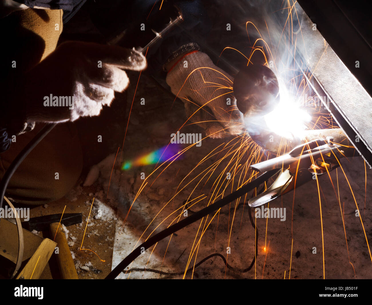 welder welding car at night in winter Stock Photo - Alamy