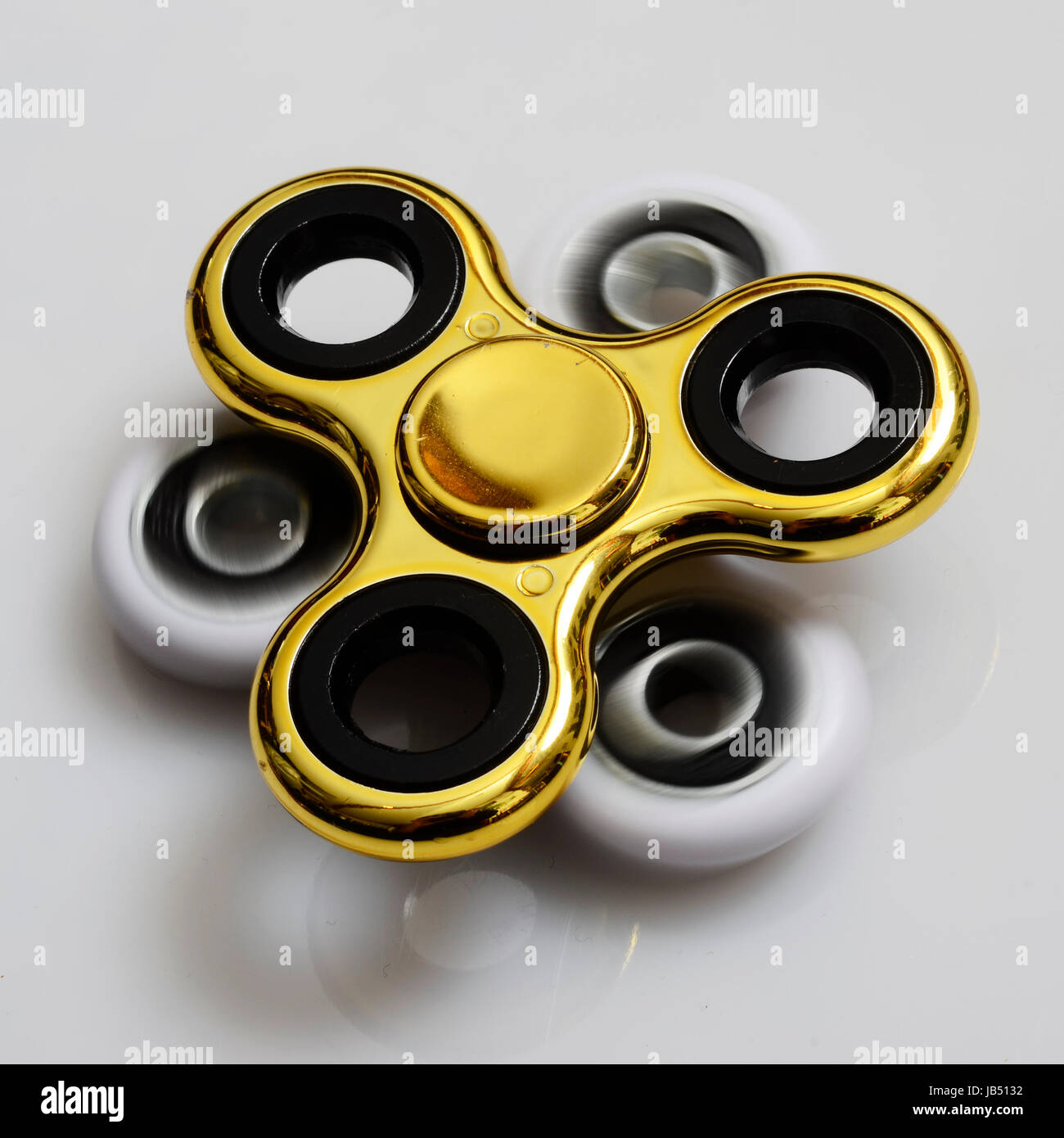 Two Hand spinner, fidgeting hand toy Stock Photo - Alamy Two Hand spinner, fidgeting hand toy Stock Photo - Alamy