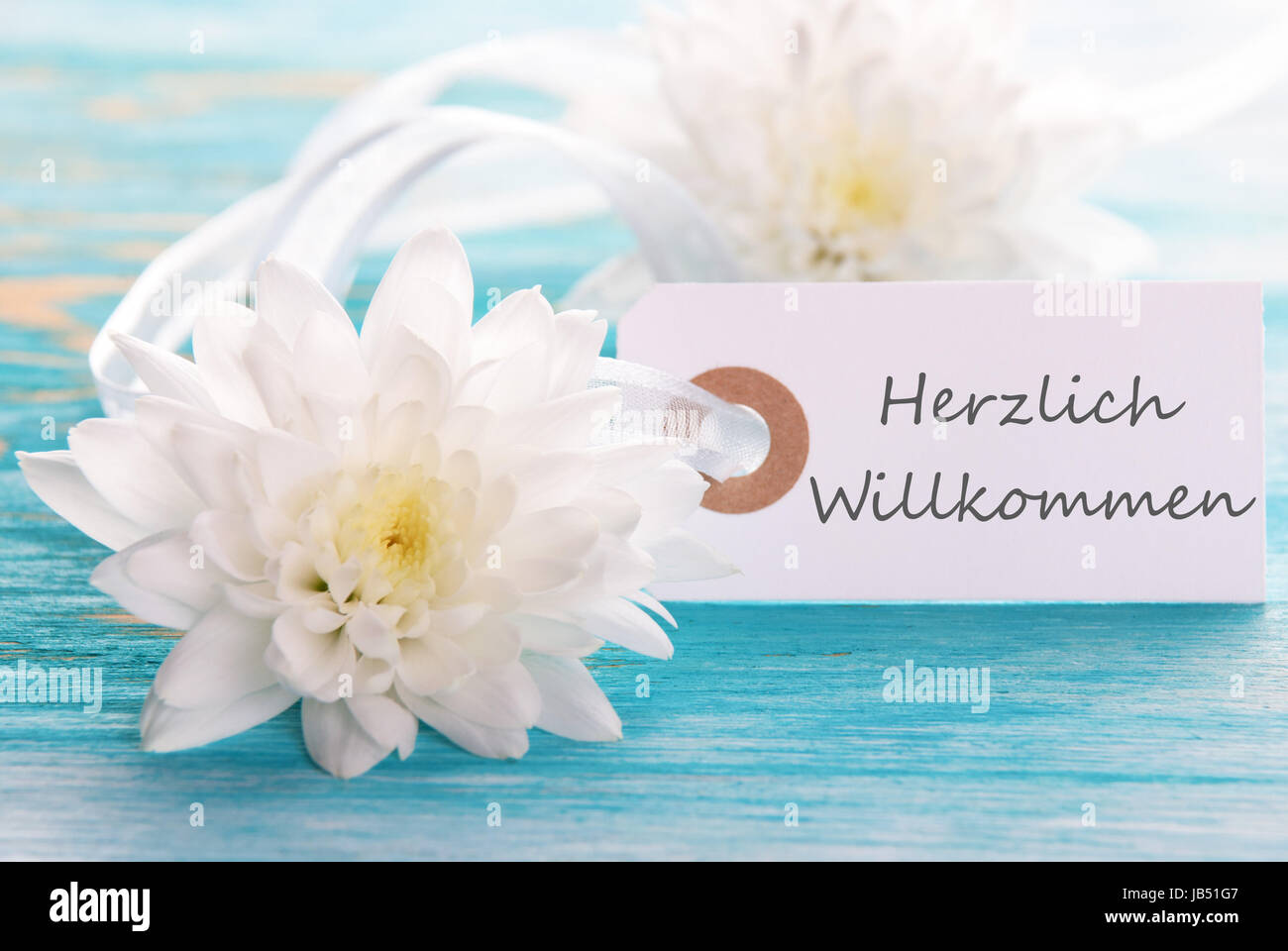 Banner with the German Words Herzlich Willkommen which means Welcome ...