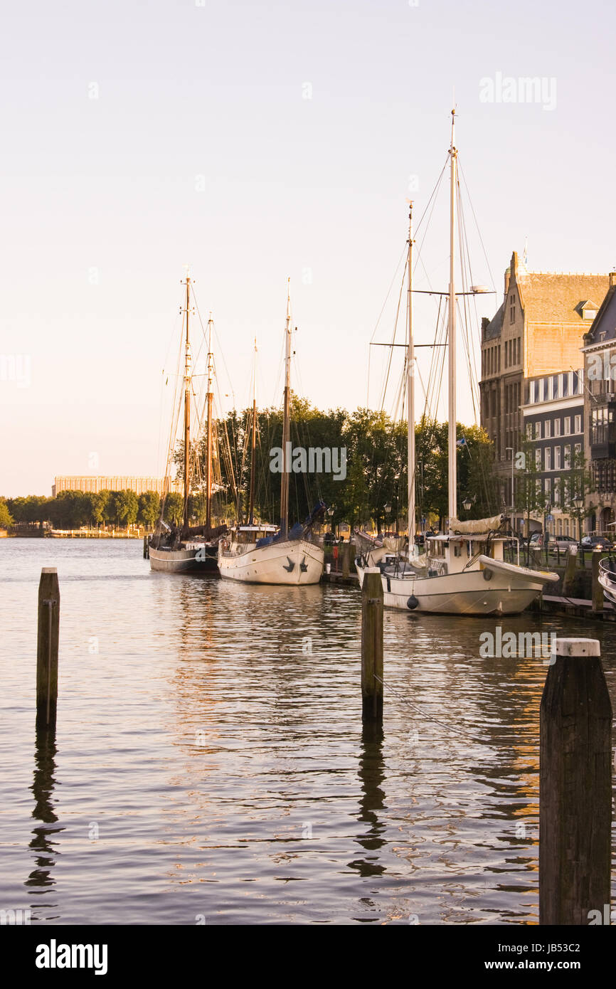 Small harbour in Rotterdam with old sailingships in evening light Stock ...