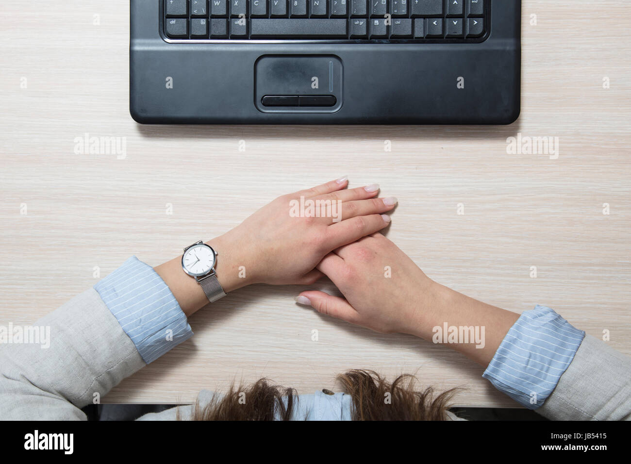 Idler idle at work, top view at desk Stock Photo - Alamy