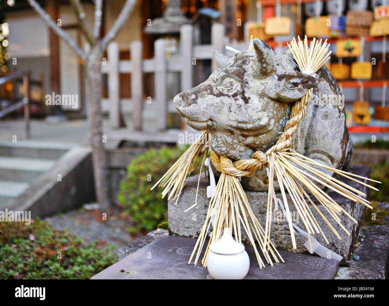 Stone cow Statue in Japanese temple Stock Photo - Alamy